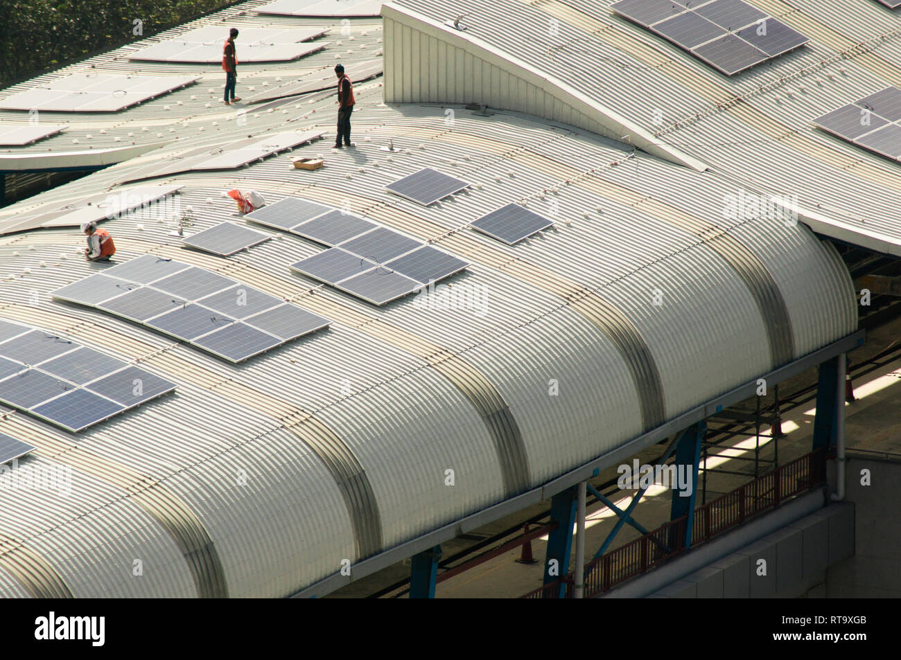Solar panels being installed on the roof of delhi metro station Stock ...