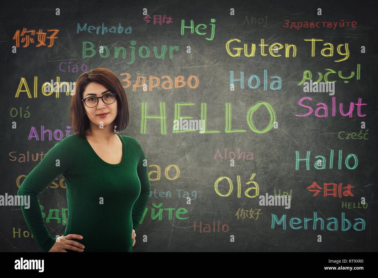 Young woman student or teacher wearing glasses and holding hands on ...