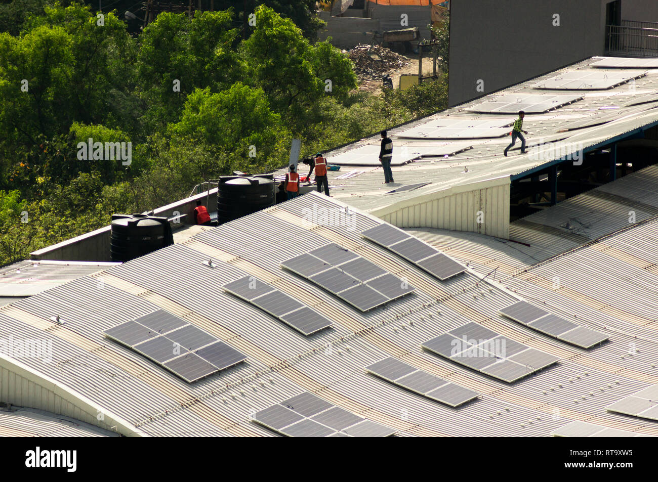 Solar panels being installed on the roof of delhi metro station Stock ...