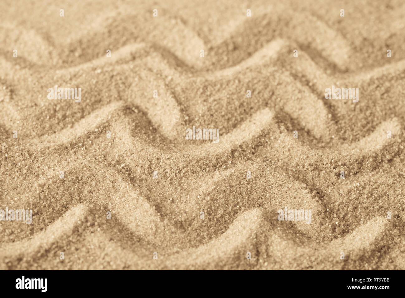 wave pattern on sand background texture macro Stock Photo - Alamy