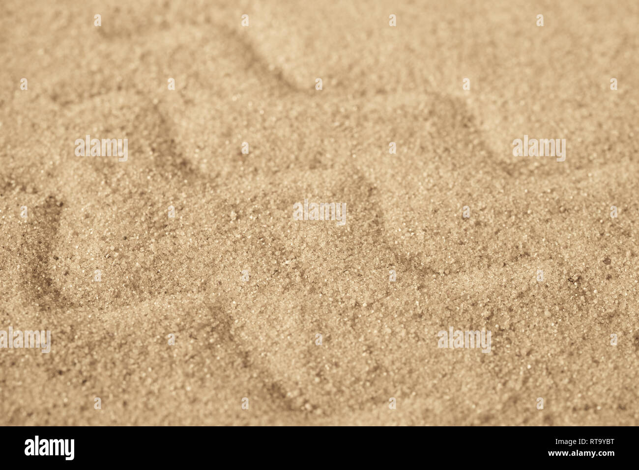 wave pattern on sand background texture macro Stock Photo - Alamy
