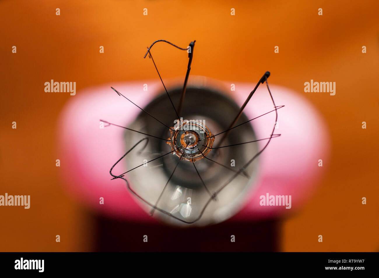 Abstract picture of filament in broken light bulb seen from top Stock ...