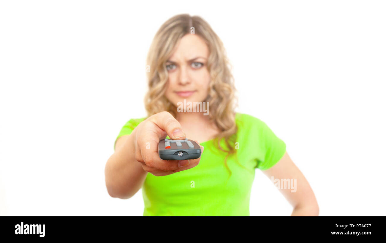 Attractive caucasian woman with TV remote in her hand Stock Photo - Alamy