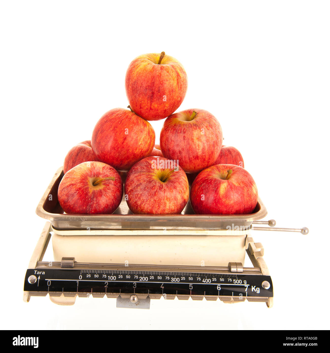 Kitchen weight scale fresh red apples isolated over white background ...