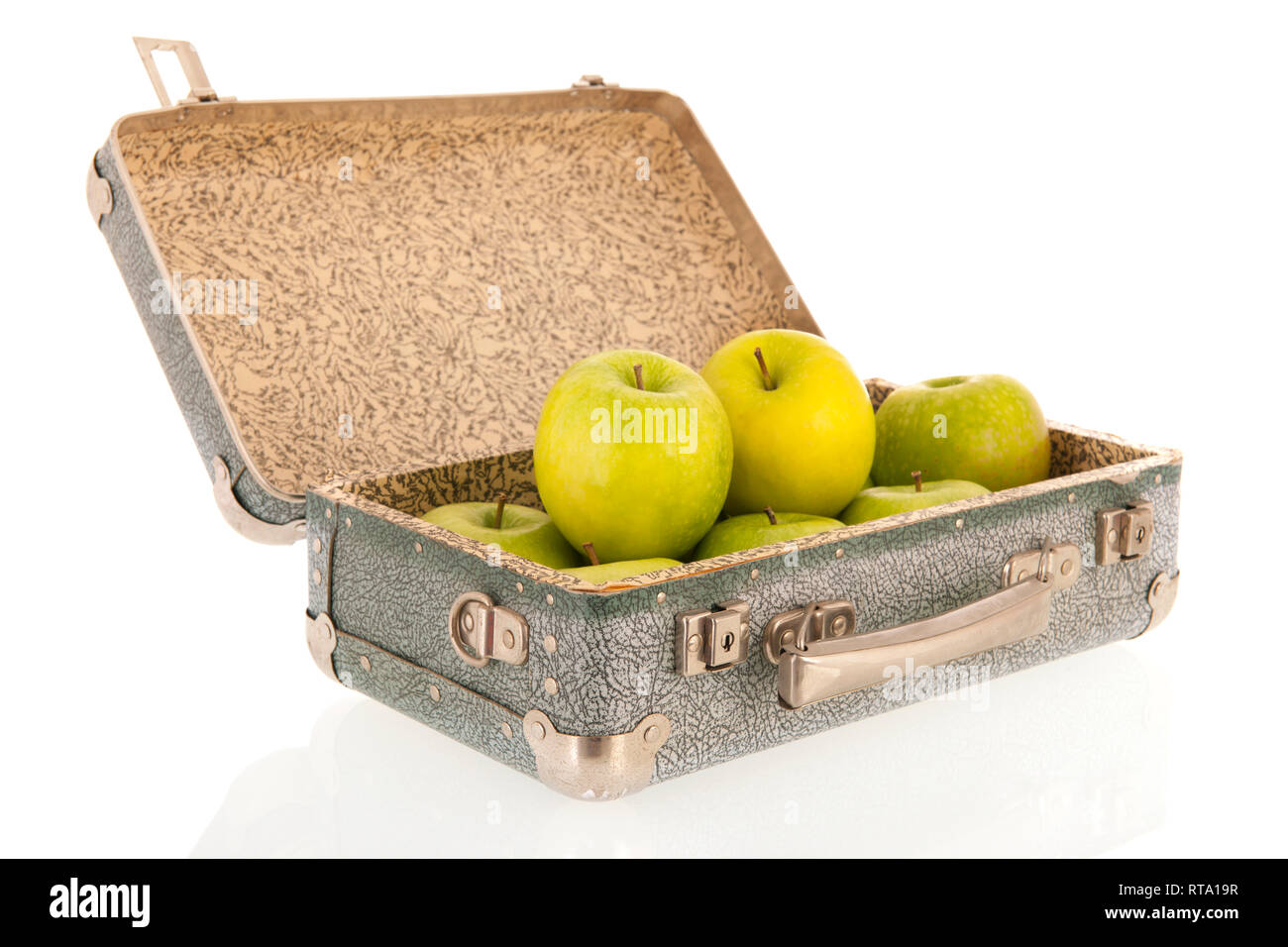 Vintage open carton suitcase filled with apples solated over white ...