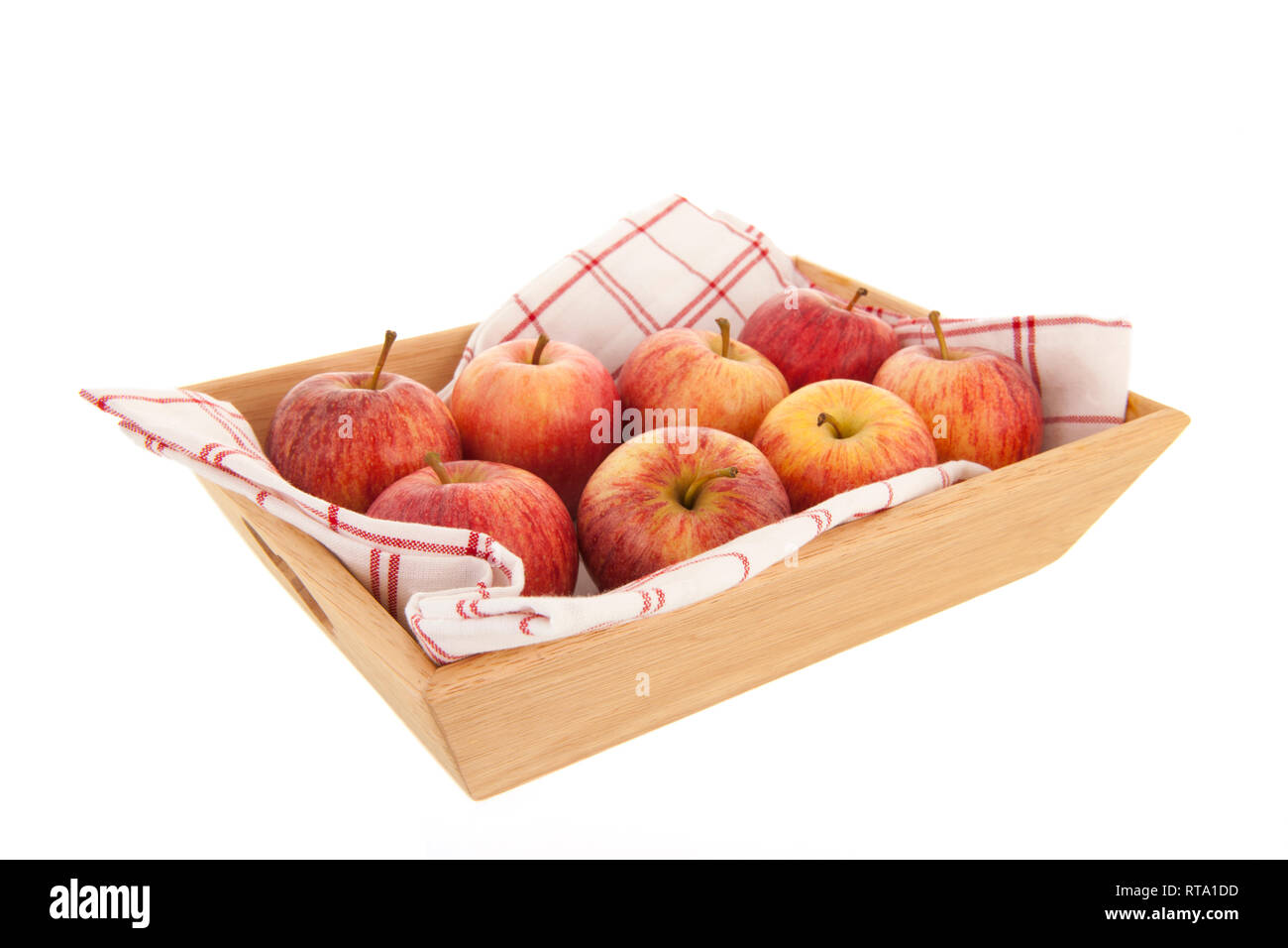 Wooden tray with red apples isolated over white background Stock Photo ...