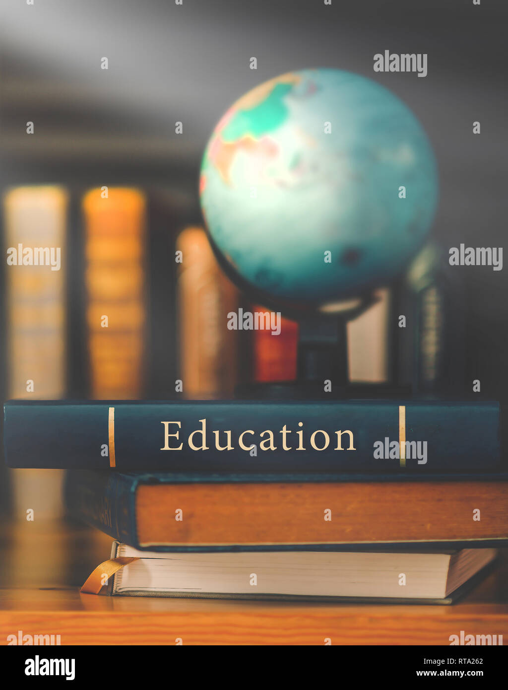 World globe on book. education school Concept Stock Photo - Alamy