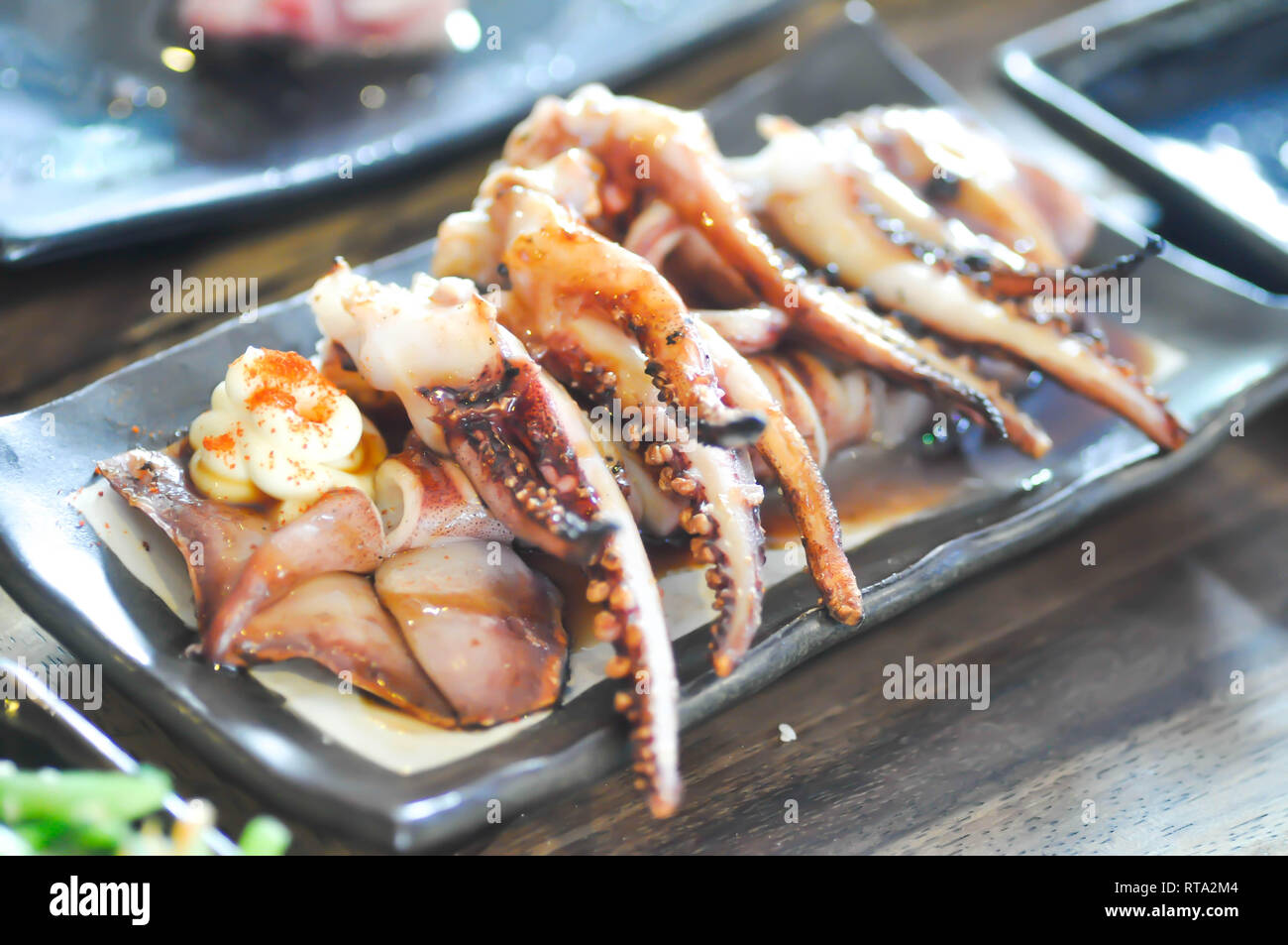 grilled squid or grilled cuttlefish dish Stock Photo - Alamy