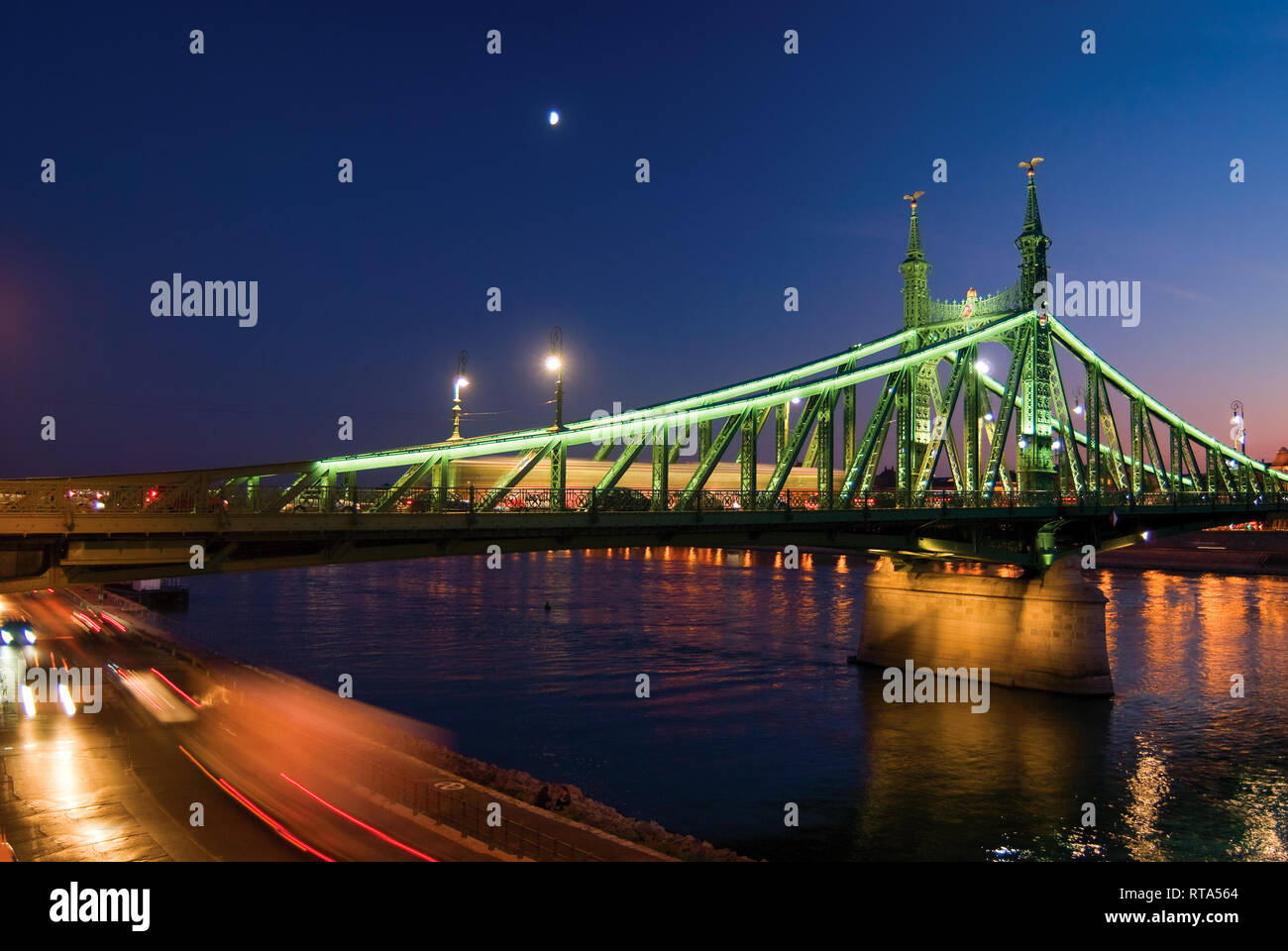 Liberty bridge in Budapest at night. Blurred traffic lights Stock Photo ...