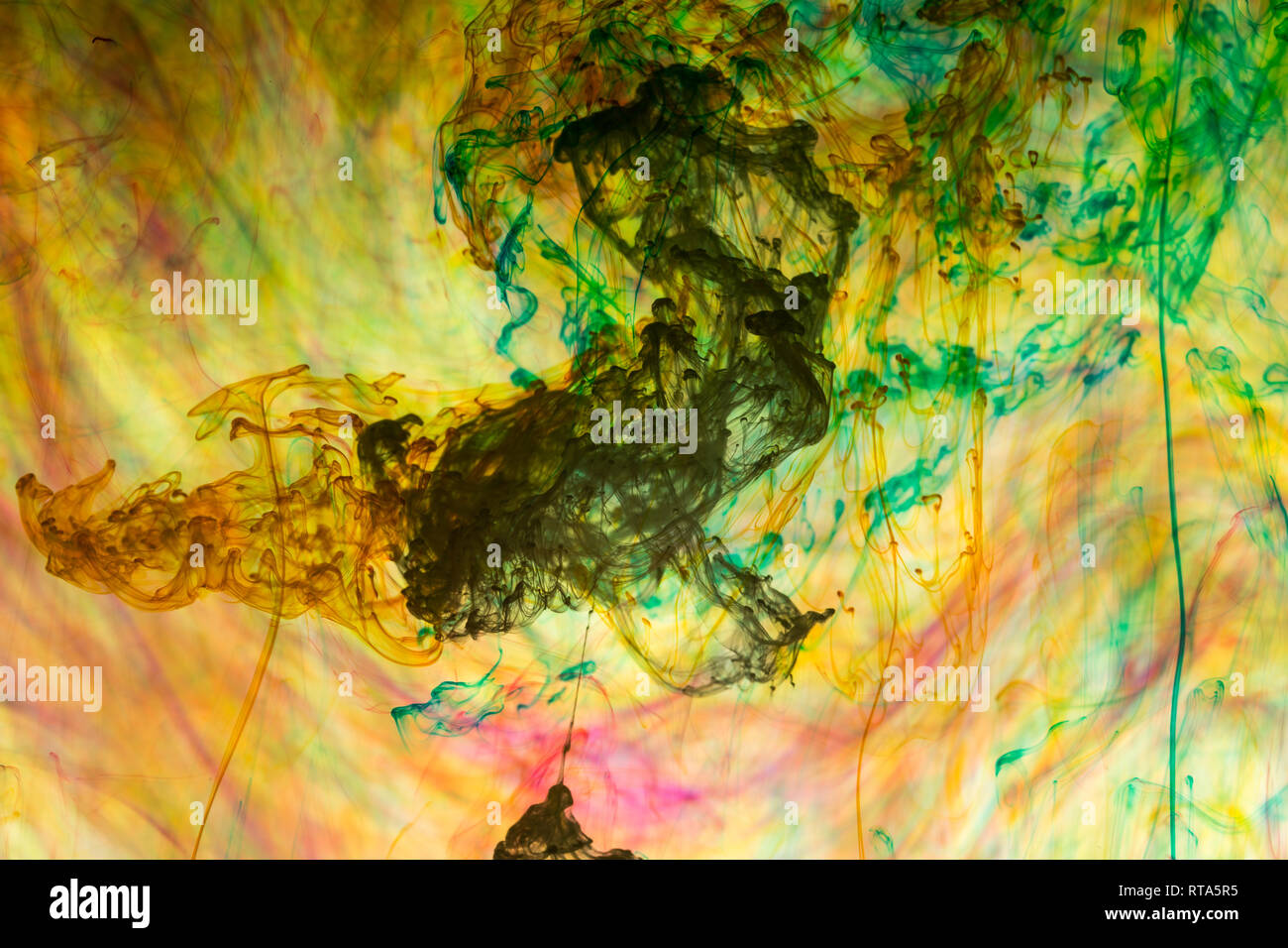 Acrylic colors and ink in water. Abstract background Stock Photo - Alamy