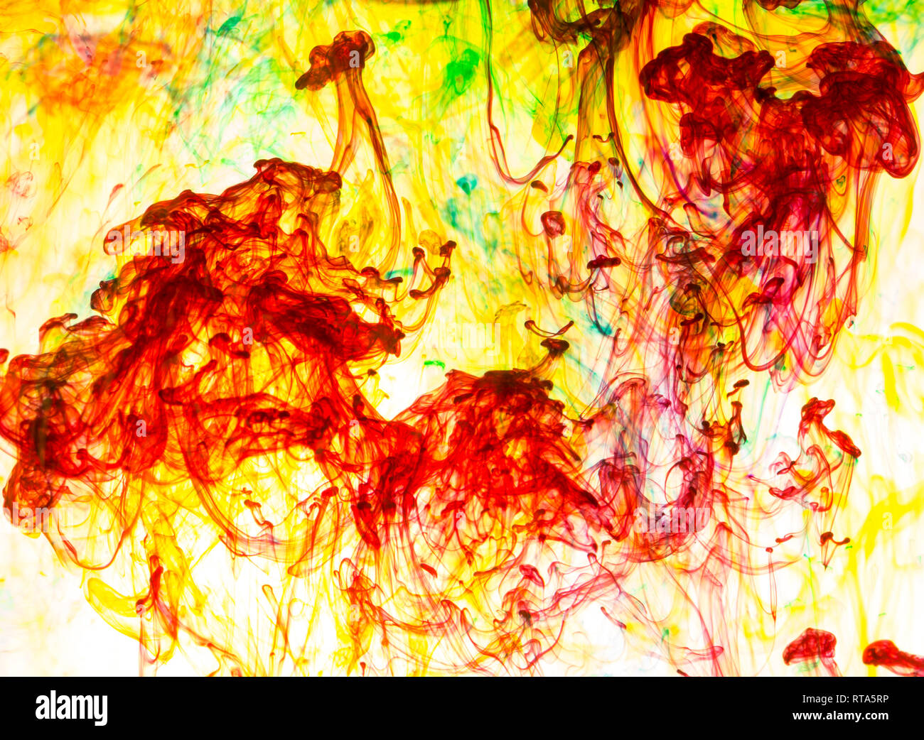 Acrylic colors and ink in water. Abstract background Stock Photo - Alamy