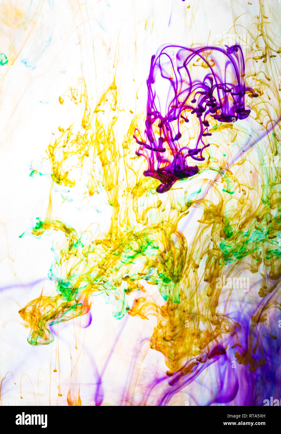 Acrylic colors and ink in water. Abstract background Stock Photo - Alamy