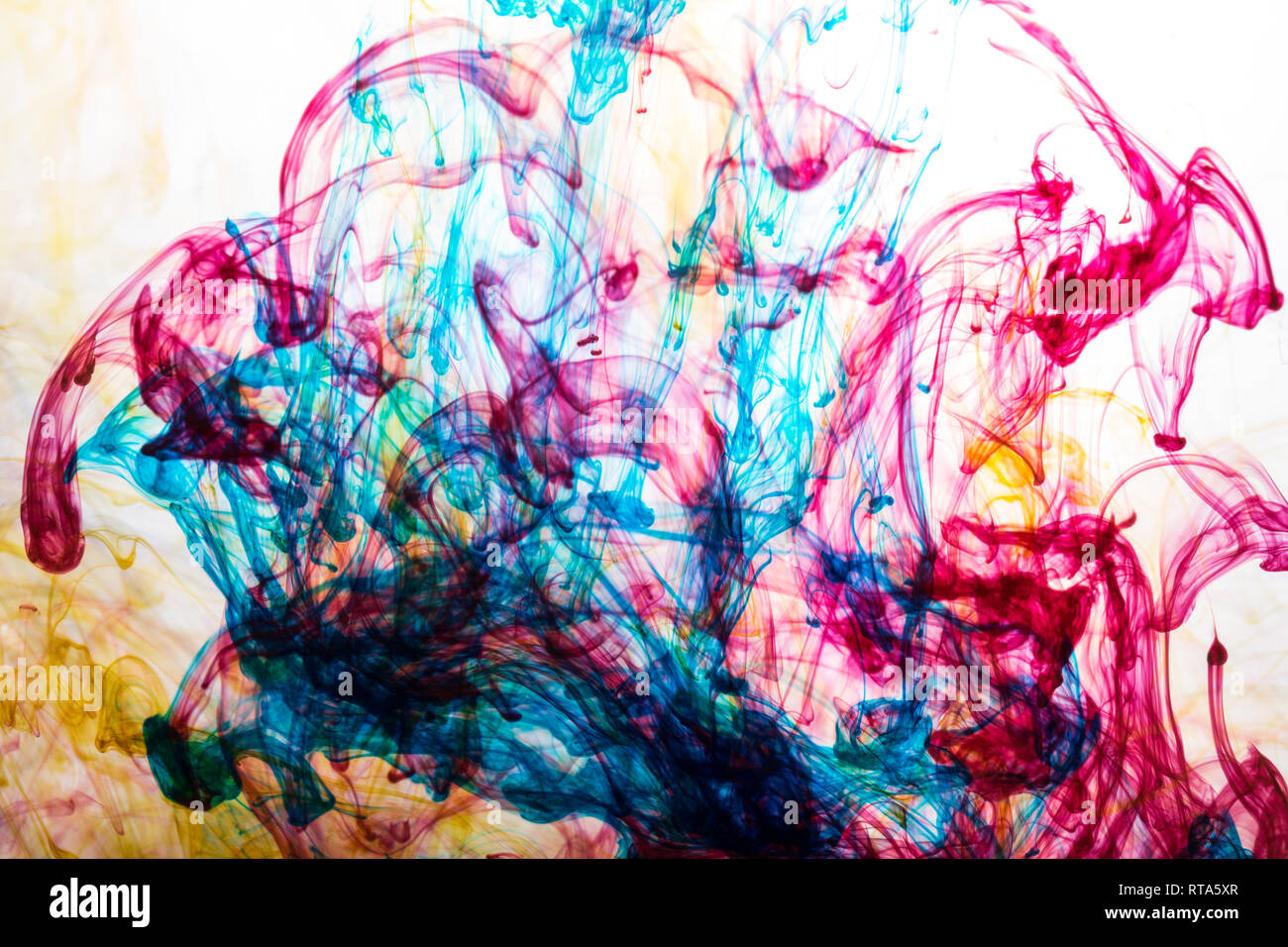 Acrylic colors and ink in water. Abstract background Stock Photo - Alamy