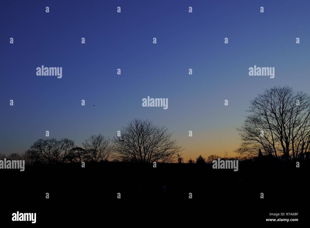 Golden sunset dark clouds hanging hi-res stock photography and images ...