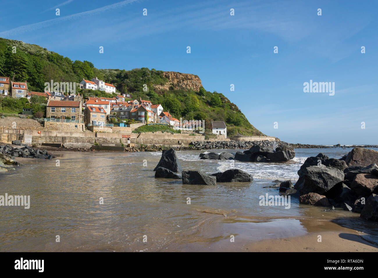 A sunny spring morning at Runswick Bay on the coast of North Yorkshire ...