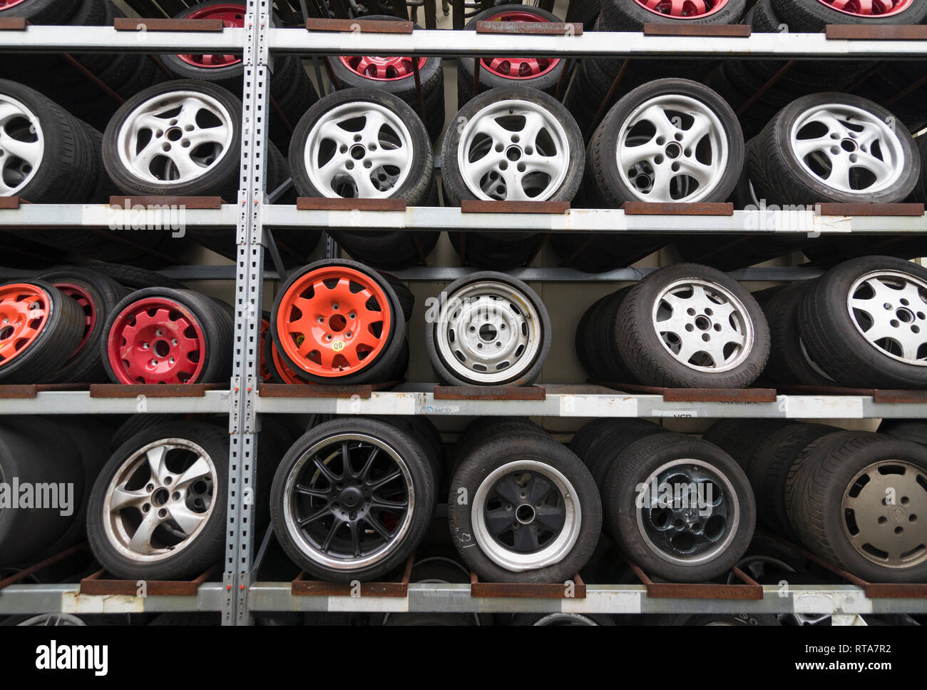 Collection of second hand wheels and tires for sale Stock Photo - Alamy