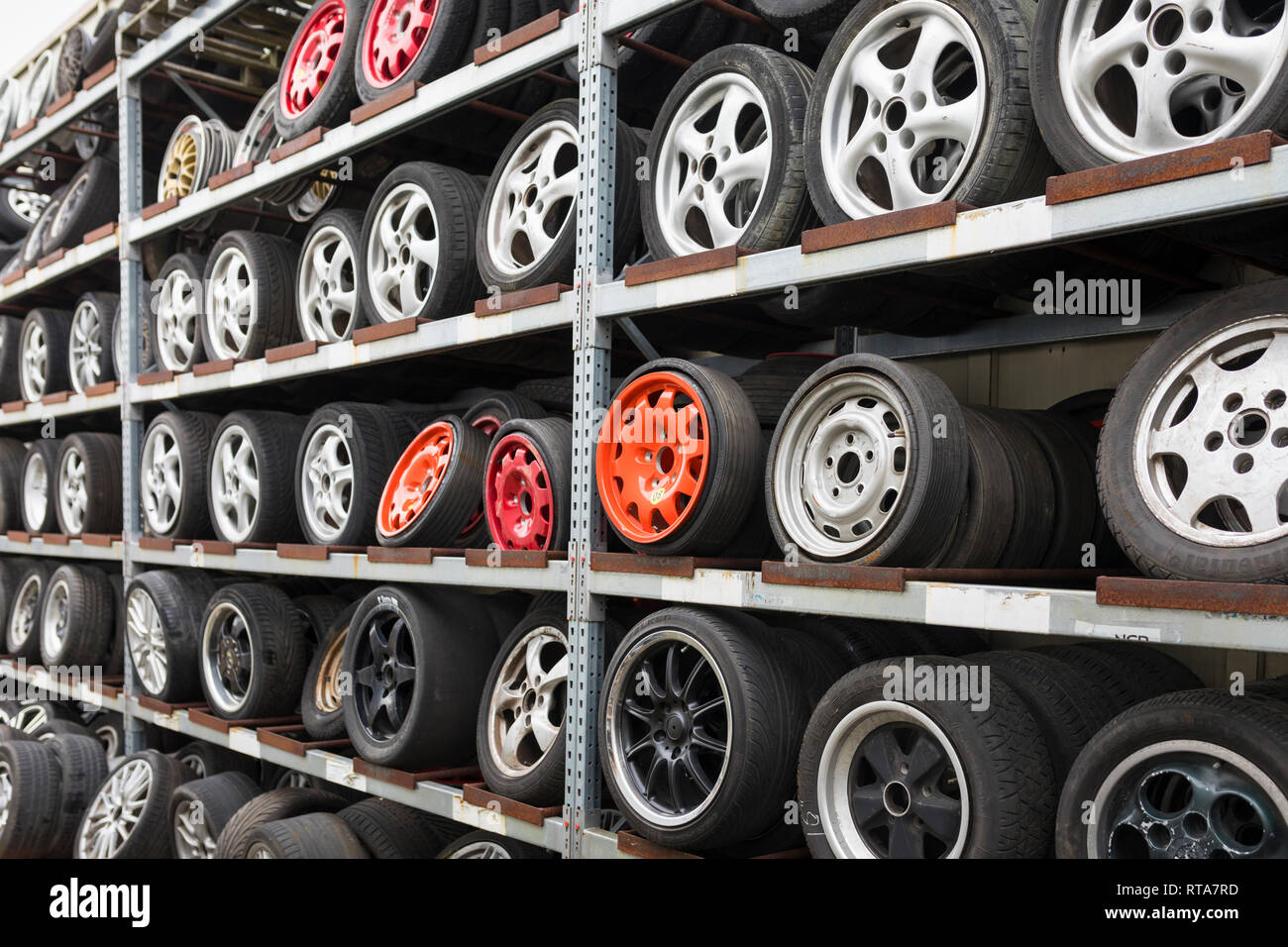 Collection of second hand wheels and tires for sale Stock Photo - Alamy