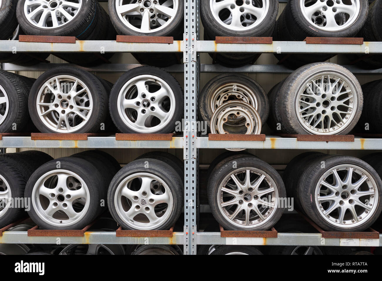 Collection of second hand wheeld and tires for sale Stock Photo - Alamy