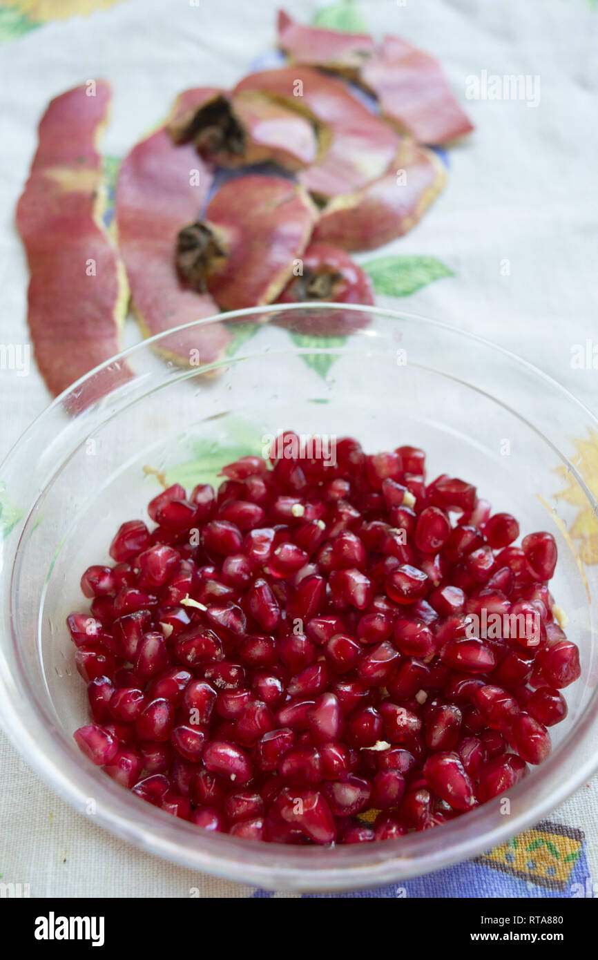 ripe pomegranate seeds with near its skins Stock Photo - Alamy