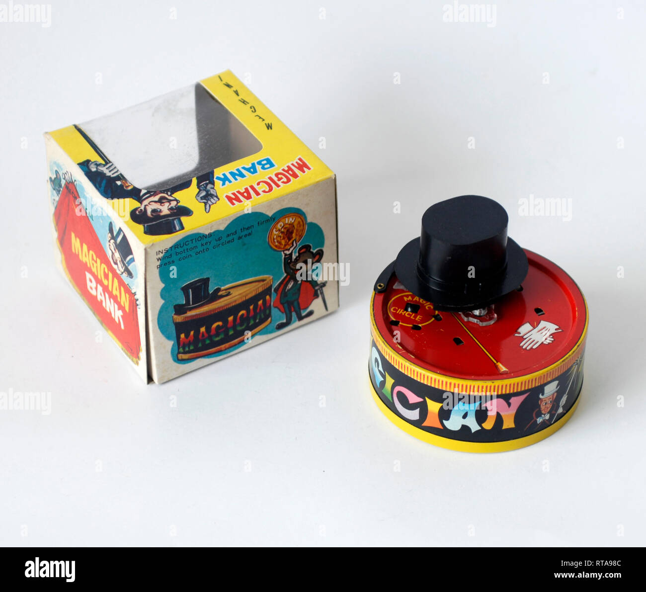 Vintage tin toy magician bank Stock Photo - Alamy