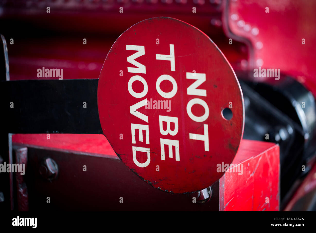 Old vintage red Not To Be Moved sign Stock Photo - Alamy