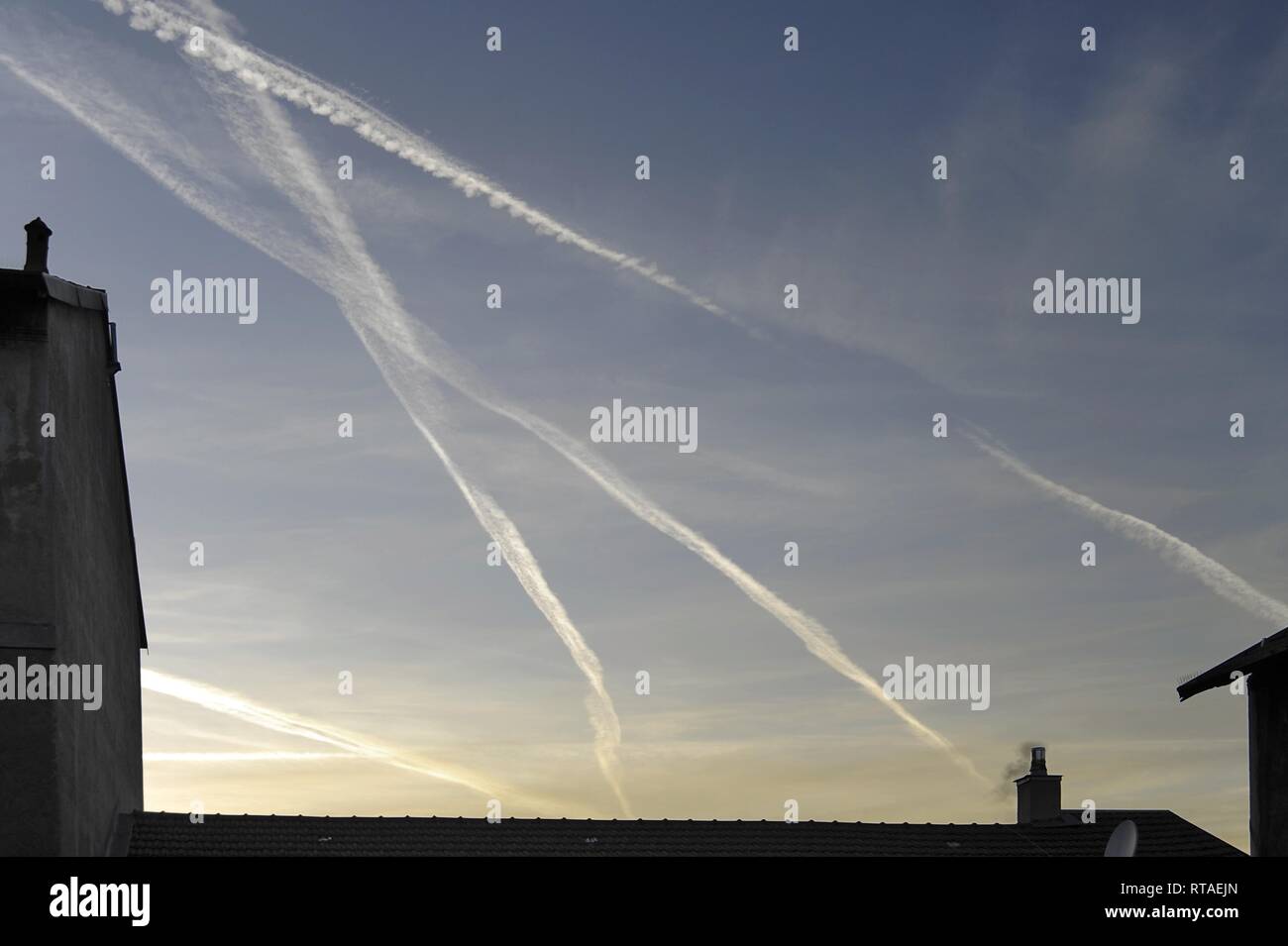 sky with condensation trails Stock Photo - Alamy