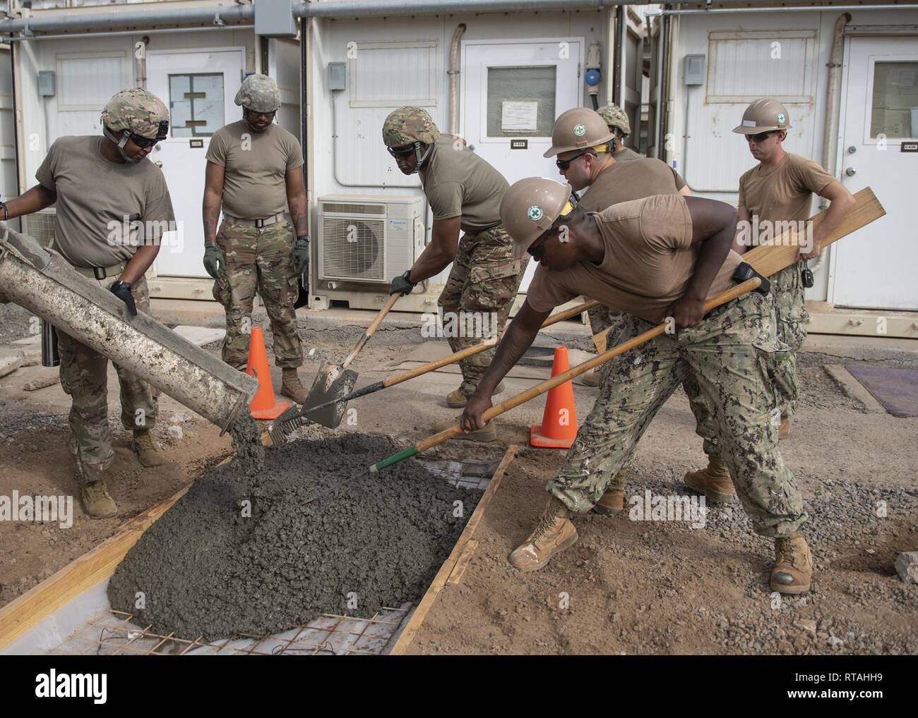 U.S. Navy Seabees from Naval Mobile Construction Battalion 1, assigned ...