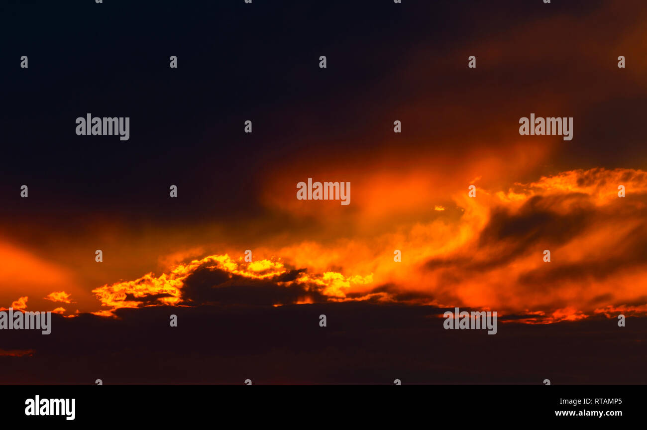 Beautiful sunset with dramatic clouds on the sky Stock Photo - Alamy