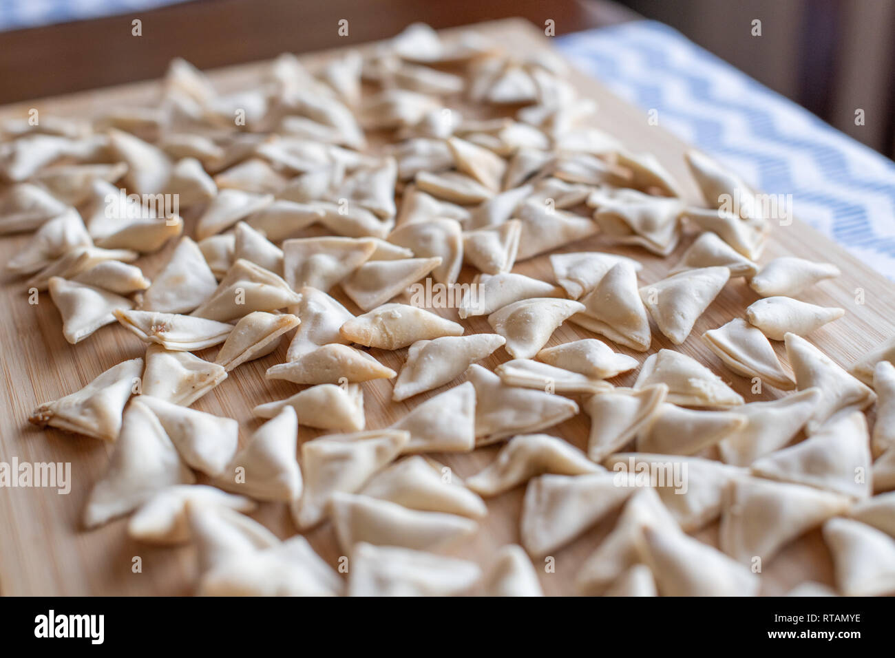 raw, uncooked triangle shaped manti. traditional turkish food. turkish ...