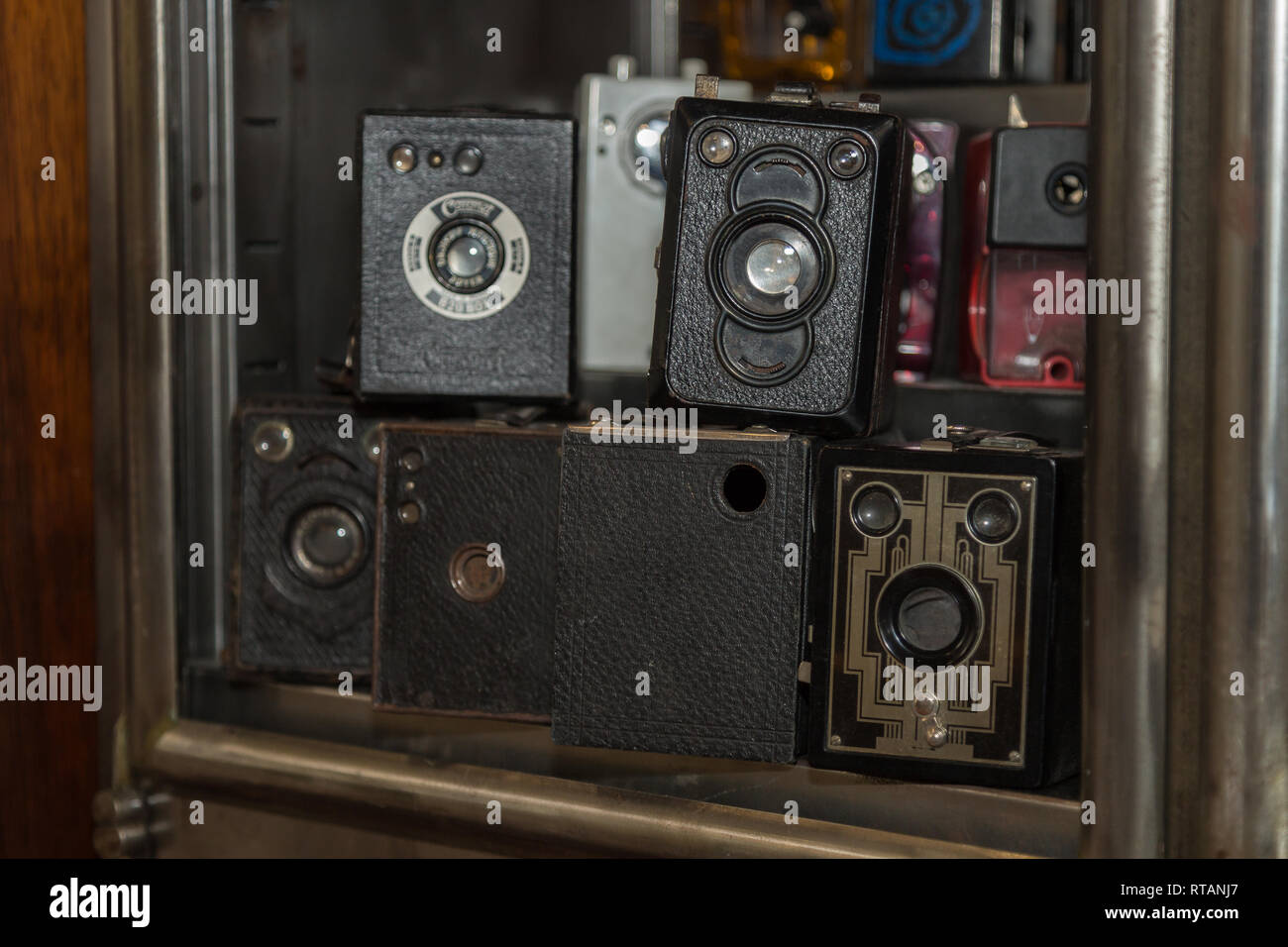 Old Vintage Box Cameras stored in a Wooden Shelf Stock Photo - Alamy