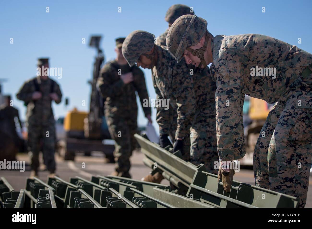U.S. Marine Corps Cpl. Brian Greene, far right, bridge noncommissioned ...