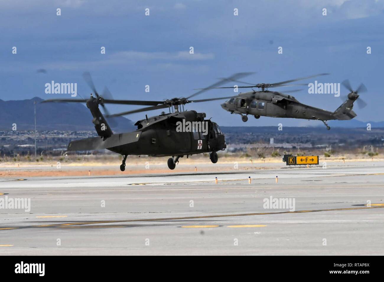 FORT BLISS, Texas – Two National Guard UH-60A/L Black Hawk helicopters ...
