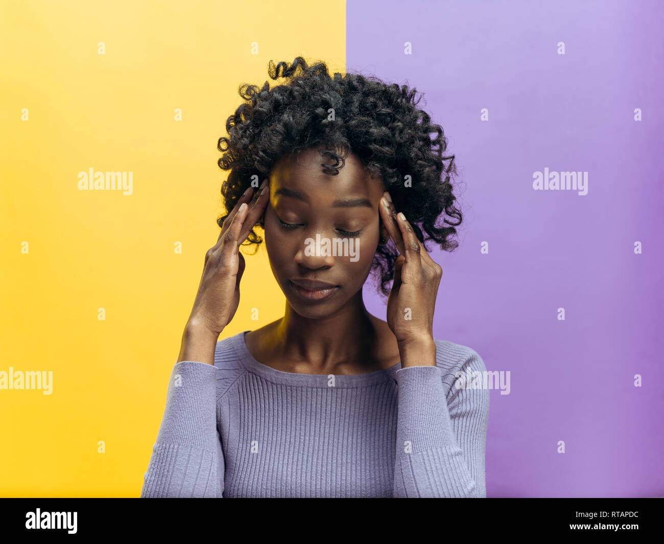 Woman having headache. Isolated on gray background. Businesswoman ...
