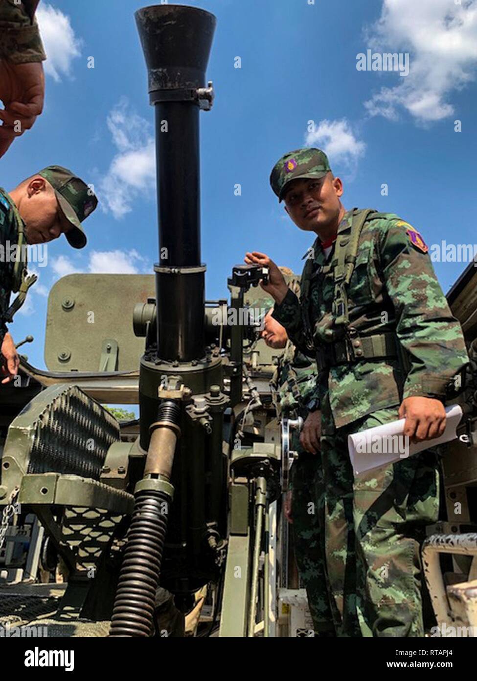 Royal Thai Army soldiers are shown some of the capabilities of an M1129 ...