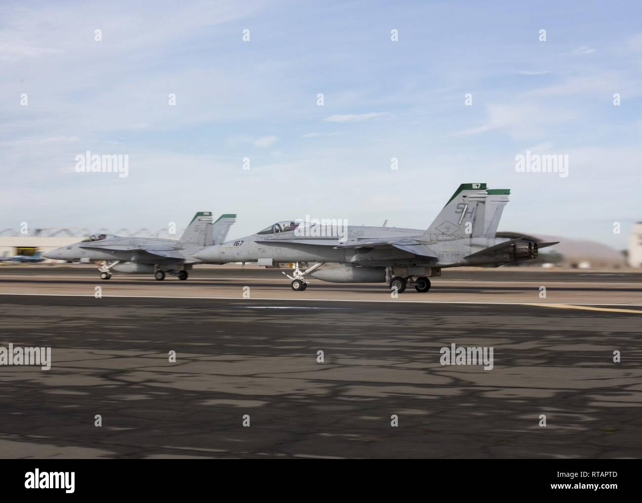 F/A-18C Hornets with Marine Aircraft Group (MAG) 11, take off as part ...