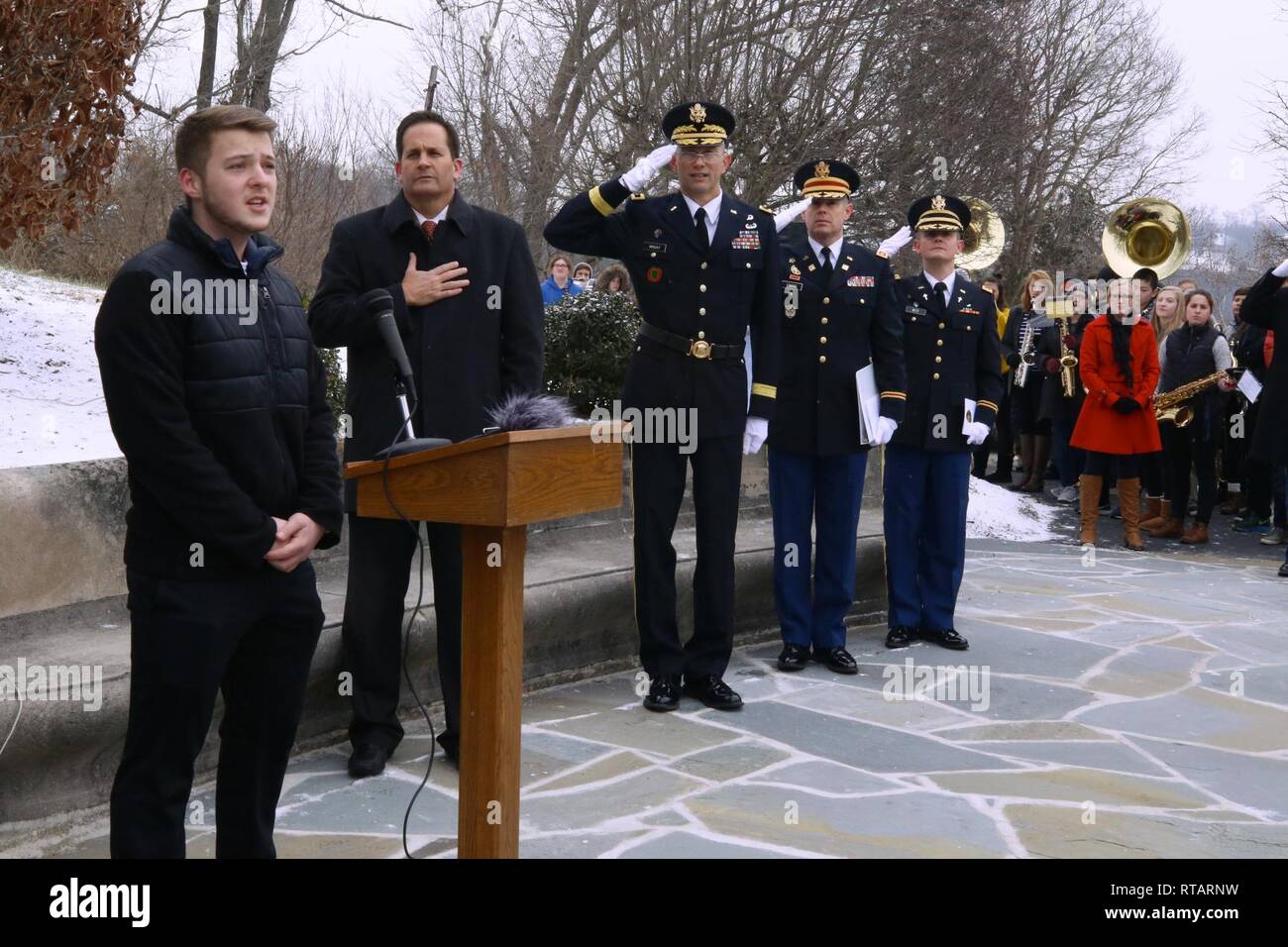 Taylor High School student sings the Star Spangled Banner during the ...