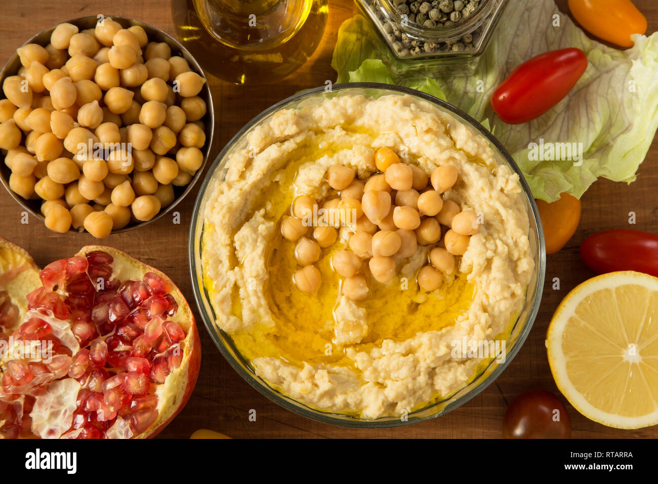 Traditional hummus with ingredients - top view Stock Photo - Alamy