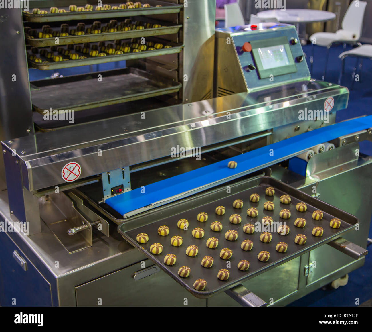 Production line of automatic two color cookie making machine Stock ...