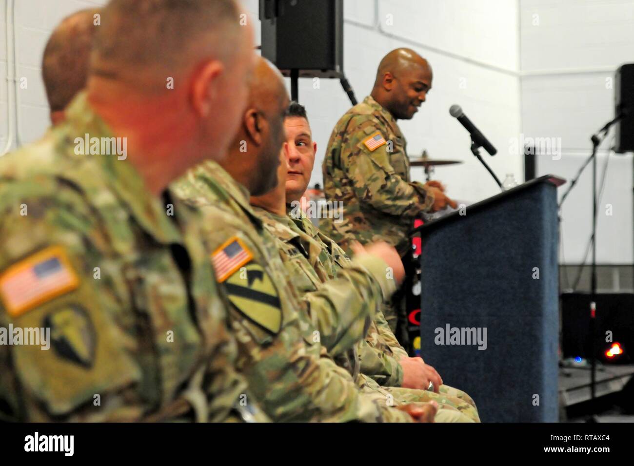Capt. Roque L. Rodriguez, company commander, addresses the families and ...