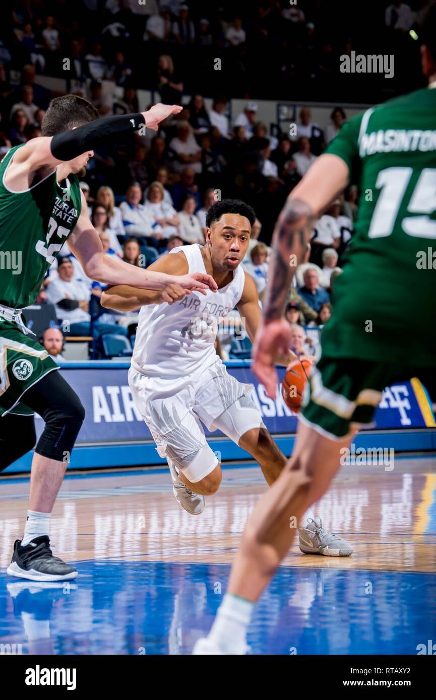 U.S. Air Force Academy – Air Force guard A.J. Walker drives through an ...