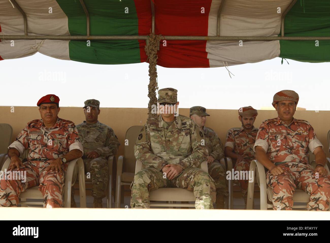 U.S. Army Brig. Gen. Michael Wickman, center, deputy commanding general ...
