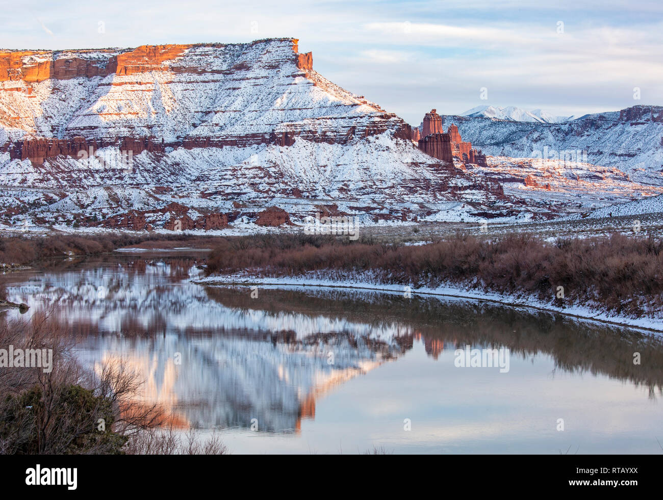 Snow from a recent storm line the banks of the Colorado and the mesas ...