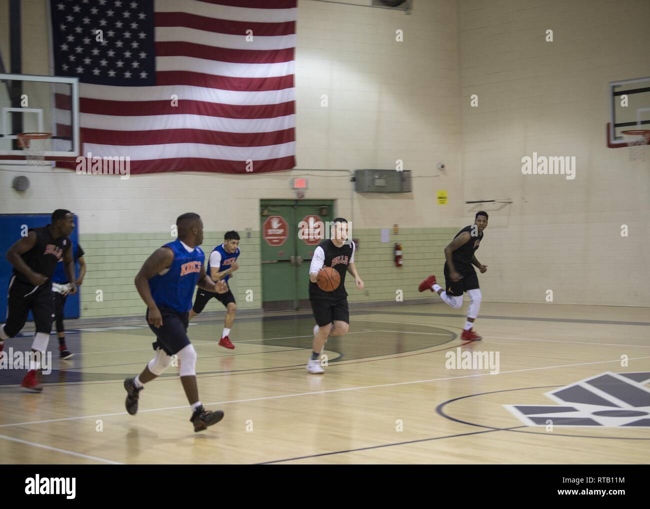 Members of the 2019 intramural basketball teams participate in a game ...