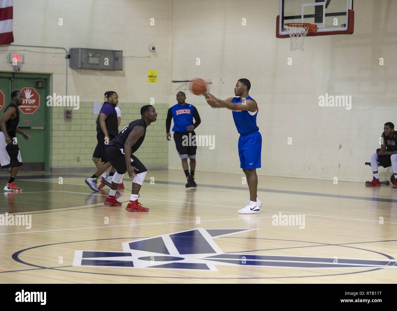 Members of the 2019 intramural basketball teams participate in a game ...