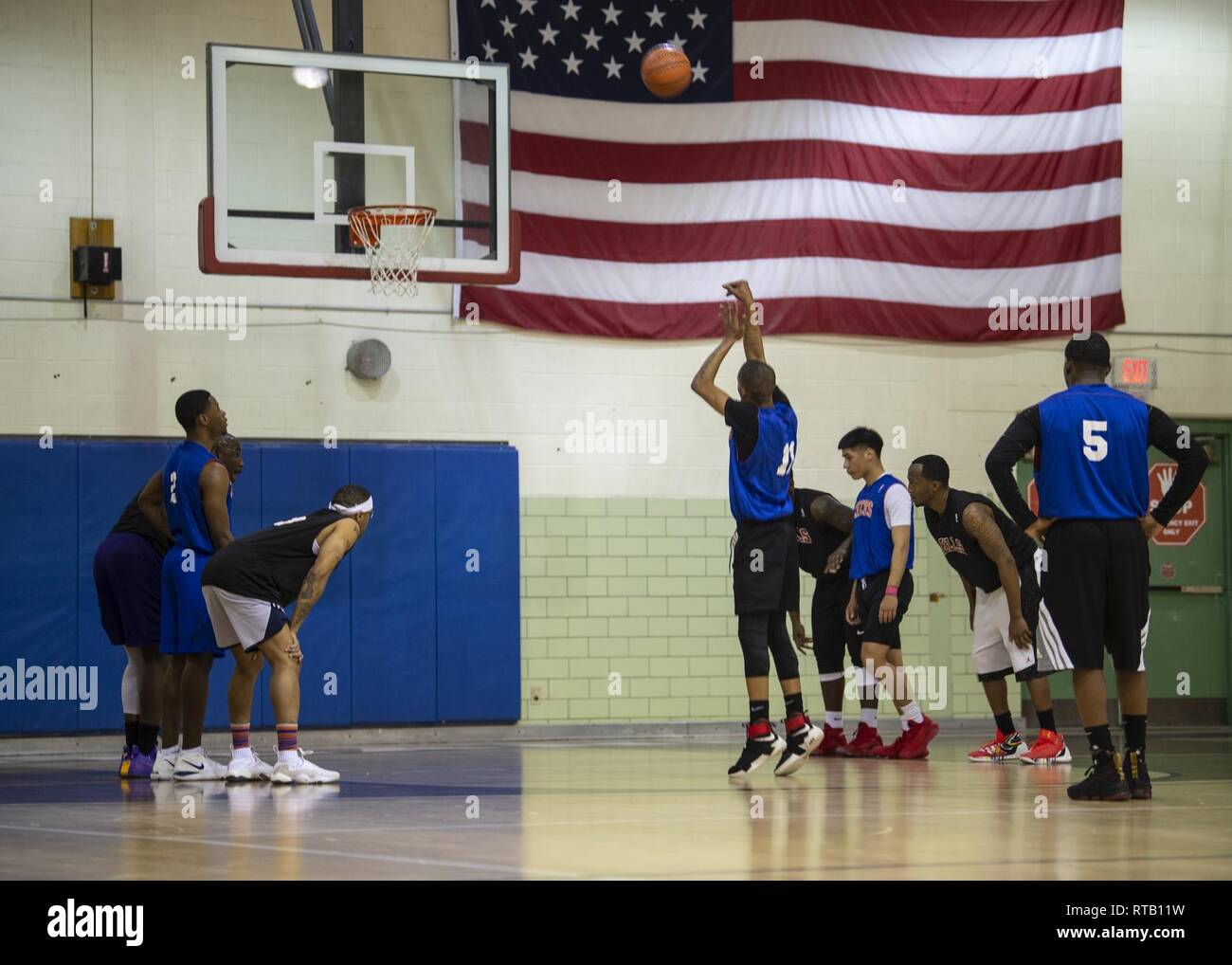 Members of the 2019 intramural basketball teams participate in a game ...