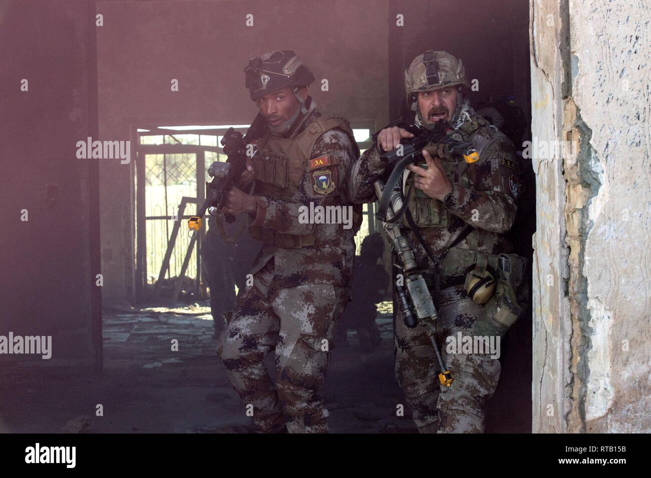 Iraqi Counter-Terrorism Service Basic Leader Course students exit a ...