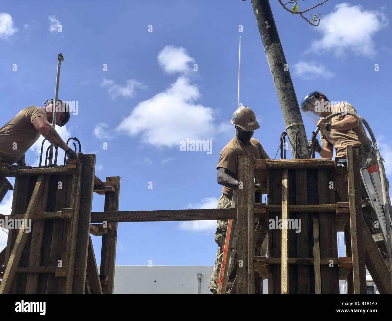 SANTA RITA, Guam (Feb. 7, 2019) Seabees assigned to Naval Mobile ...