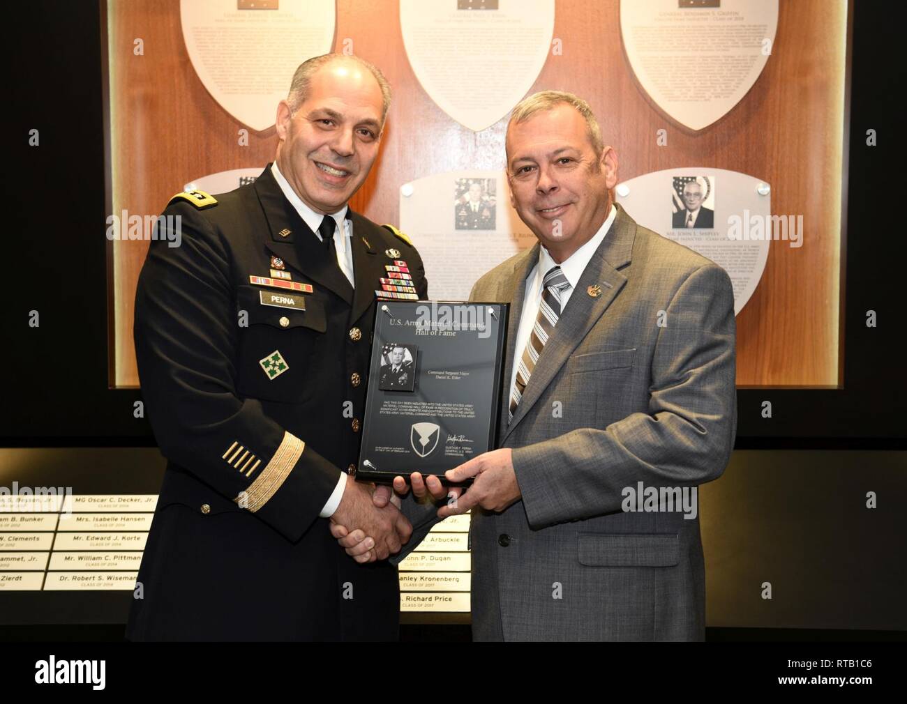 Army Materiel Command commander Gen. Gus Perna presents Daniel Elder ...