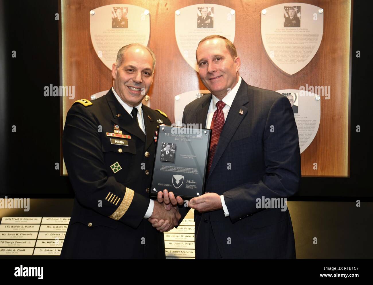 Army Materiel Command commander Gen. Gus Perna presents Ronald Riling ...