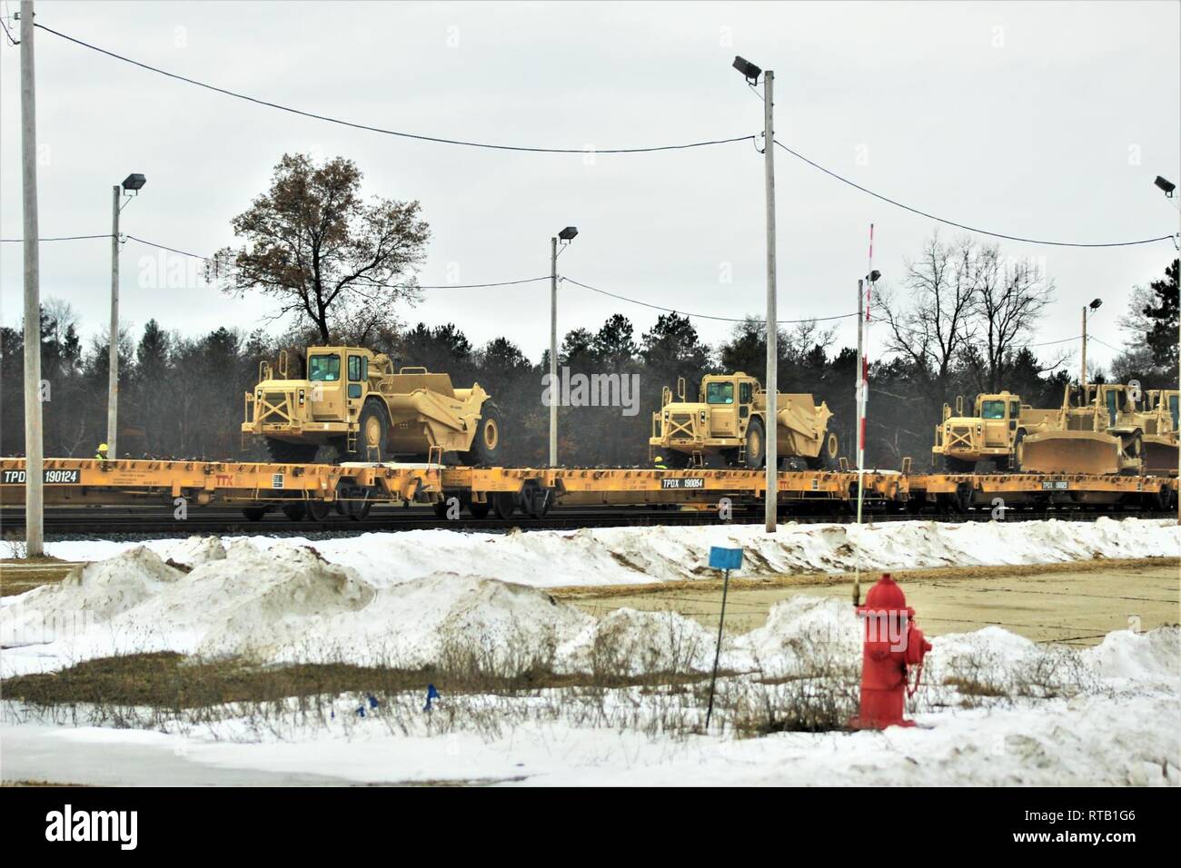 Military vehicles and equipment with the 389th Engineer Battalion is ...